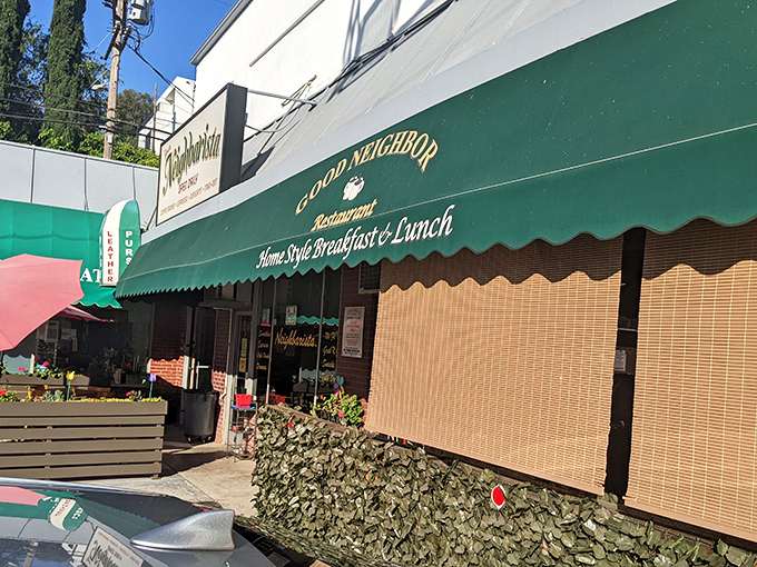 The iconic green awning of Good Neighbor Restaurant stands as a beacon of breakfast hope on Ventura Boulevard. No fancy frills, just the promise of honest food.