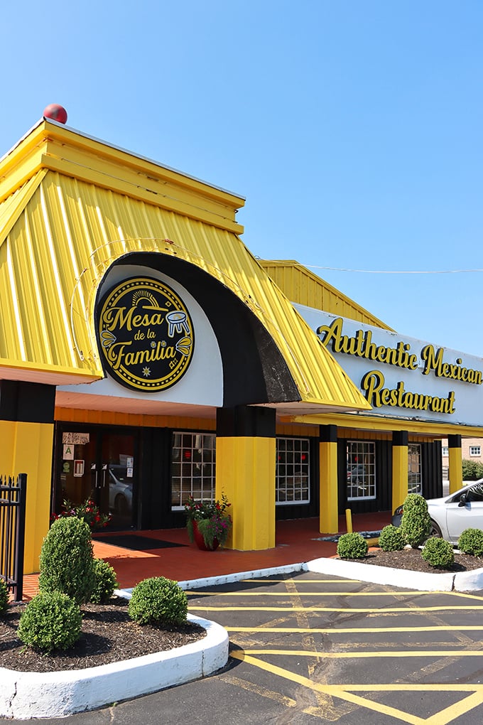 The sunshine-yellow exterior of Mesa de la Familia stands out like a beacon of culinary hope in Louisville, promising authentic Mexican flavors inside.