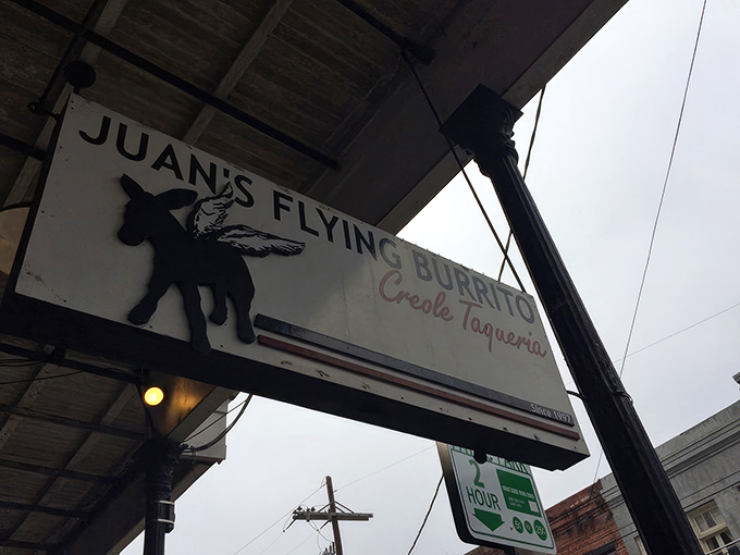 The iconic winged donkey sign beckons hungry travelers like a mythical creature promising culinary adventures. This isn't just a sign&mdash;it's a promise.