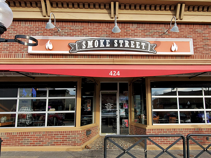 The bright red awning of Smoke Street beckons like a barbecue beacon on Milford's Main Street, promising smoky delights within.
