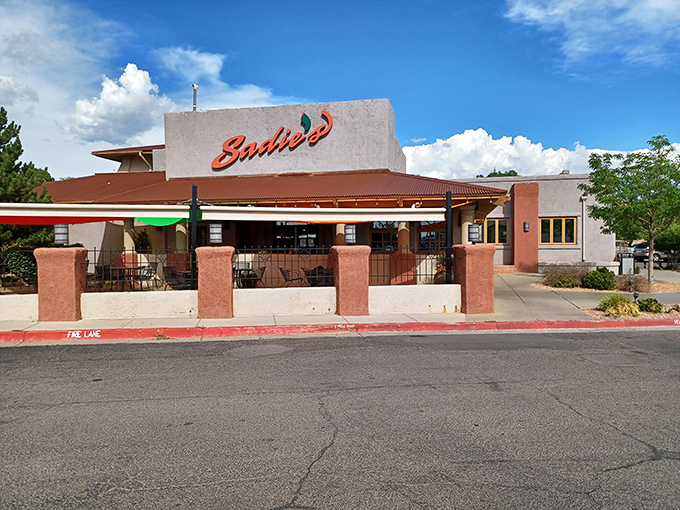Sadie's iconic adobe-style exterior stands proudly against New Mexico's brilliant blue sky, like a delicious mirage beckoning hungry travelers.