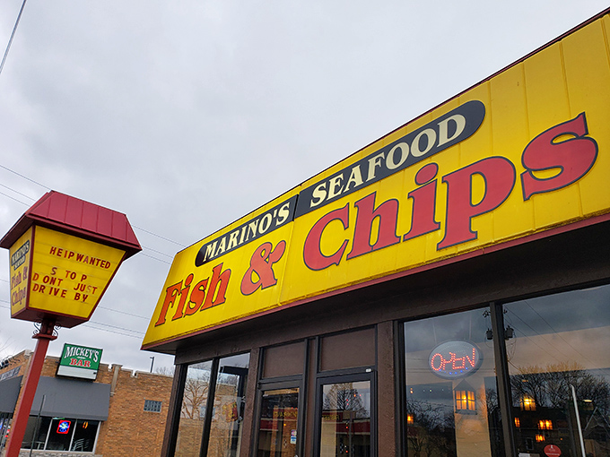 The bright yellow beacon of Marino's stands out like a culinary lighthouse, guiding hungry Columbus residents to seafood salvation regardless of weather.