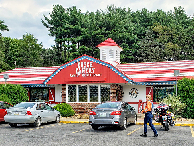 The iconic red barn exterior of Dutch Pantry stands like a beacon of comfort food amid Pennsylvania's greenery. Americana at its most delicious.