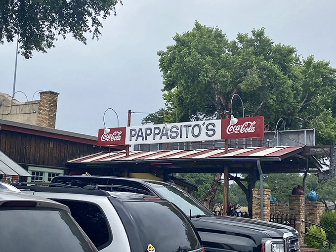 Pappasito's neon-lit exterior glows like a Tex-Mex lighthouse, beckoning hungry travelers with its colorful charm and promise of culinary adventure.