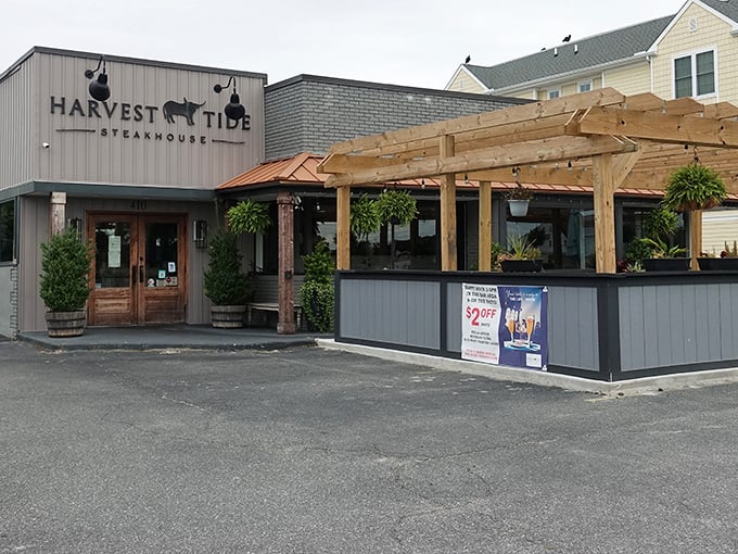 Harvest Tide's welcoming exterior promises culinary adventures within, where coastal charm meets steakhouse sophistication under Delaware's expansive sky.