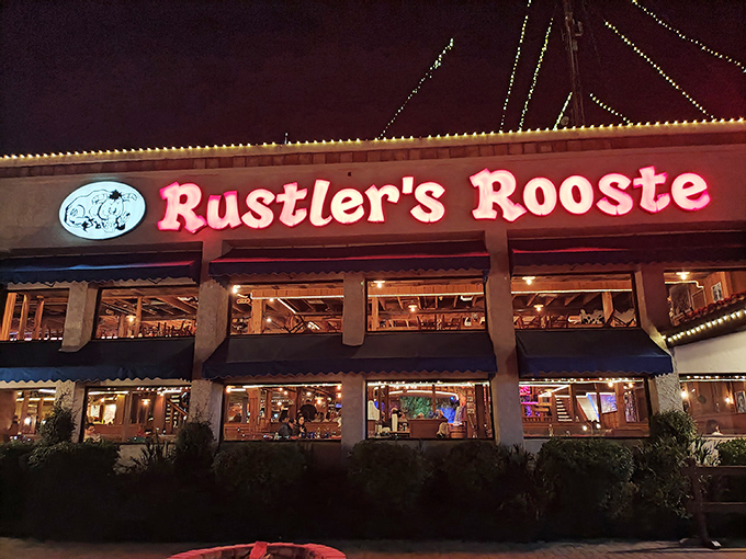 That sunset backdrop makes this Western steakhouse look like a movie set where cowboys actually eat well. 