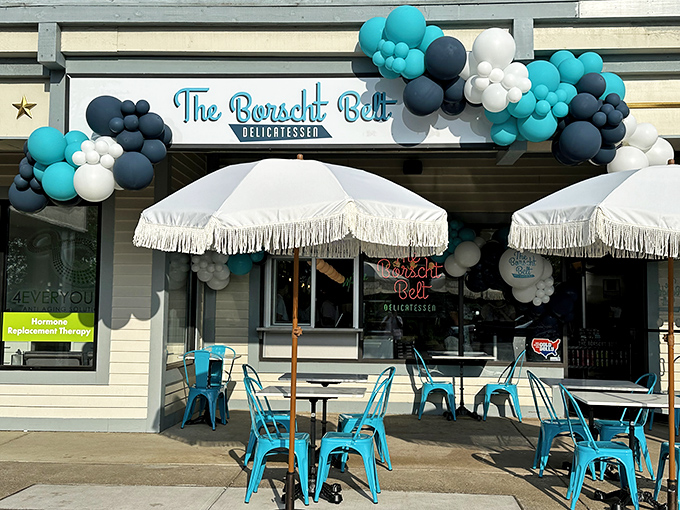 The promise of culinary nirvana hides behind this unassuming storefront, where those turquoise chairs beckon like old friends ready for a good schmooze.