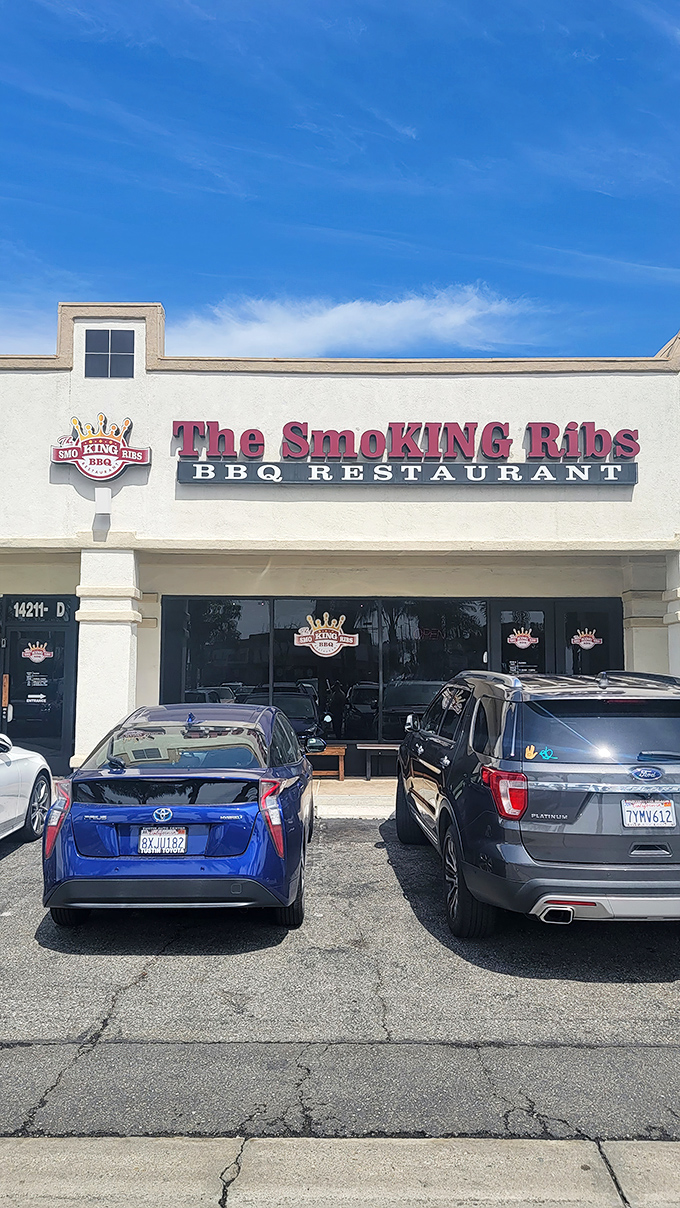 The bright red signage against the white stucco is like a barbecue beacon calling to hungry souls. No fancy frills needed when the food does the talking.