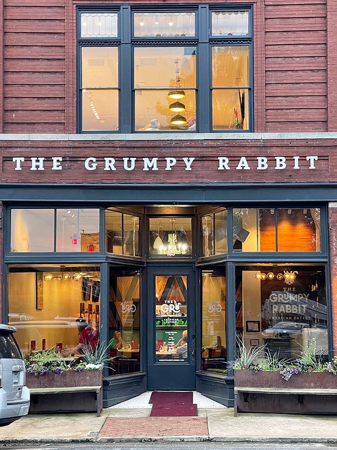 The historic brick facade of The Grumpy Rabbit stands proudly on Lonoke's main street, promising culinary adventures behind those welcoming windows.