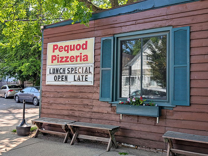 The unassuming wooden exterior of Pequod's hides pizza greatness like Clark Kent's glasses hide Superman. This humble facade in Morton Grove has become a pilgrimage site.
