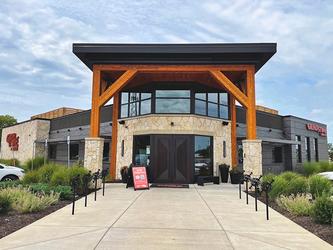The stone and timber fa&ccedil;ade of Grindstone on the Monon stands like a welcoming beacon for hungry travelers. Rustic elegance meets Hoosier hospitality at first glance.