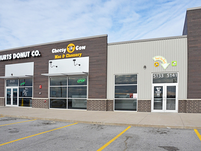 The unassuming storefront of Cheesy Cow sits like a dairy-filled oasis in a Bettendorf strip mall, promising comfort food nirvana to cheese pilgrims.