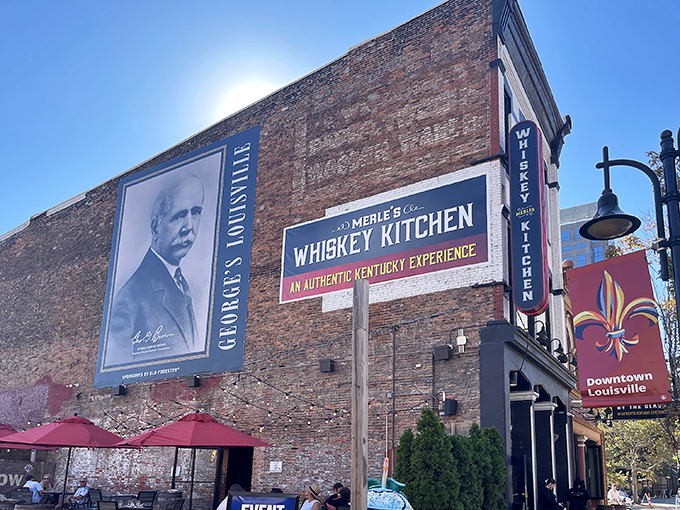 Historic brick meets modern Louisville skyline at Merle's Whiskey Kitchen, where bourbon country's culinary traditions come alive in the heart of Whiskey Row.