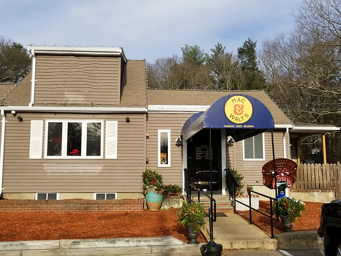 The unassuming exterior of Mac & Walt's proves once again that the best comfort food often hides in plain sight among New England's pines.