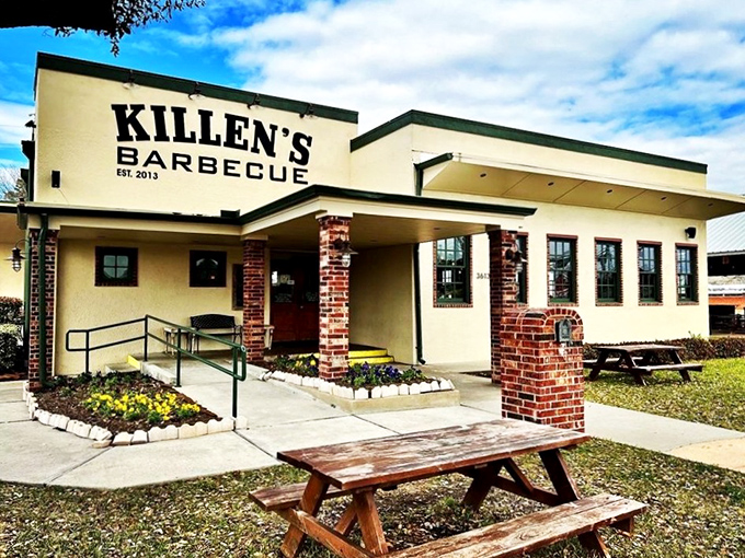 The unassuming exterior of Killen's BBQ stands like a temple to Texas smoking traditions, promising transcendent meat experiences within its humble walls.