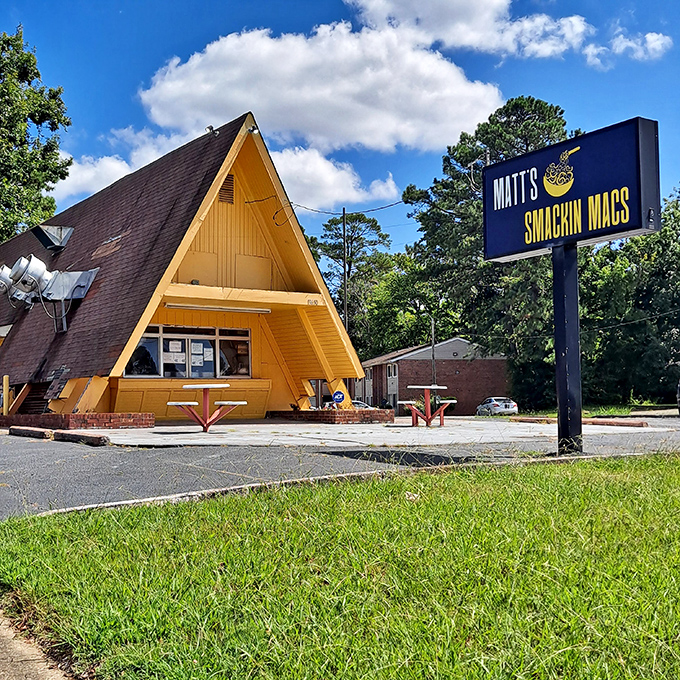 The bright orange A-frame building stands like a cheese-colored beacon of hope for comfort food enthusiasts across Newport News.