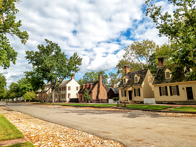 The octagonal cupola of Williamsburg's historic schoolhouse stands sentinel over brick buildings that have witnessed centuries of American history unfold beneath Virginia skies.