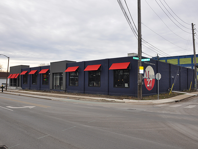 The navy blue exterior with striking red awnings makes Mission 27 Resale stand out like a fashionable thumb on Indianapolis' Shelby Street.