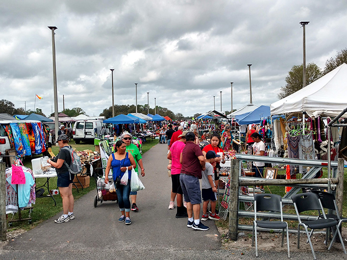 Treasure hunters navigate the bustling aisles of Plant City's weekend wonderland. The thrill of discovery hangs in the air like Florida humidity&mdash;inescapable and oddly energizing.