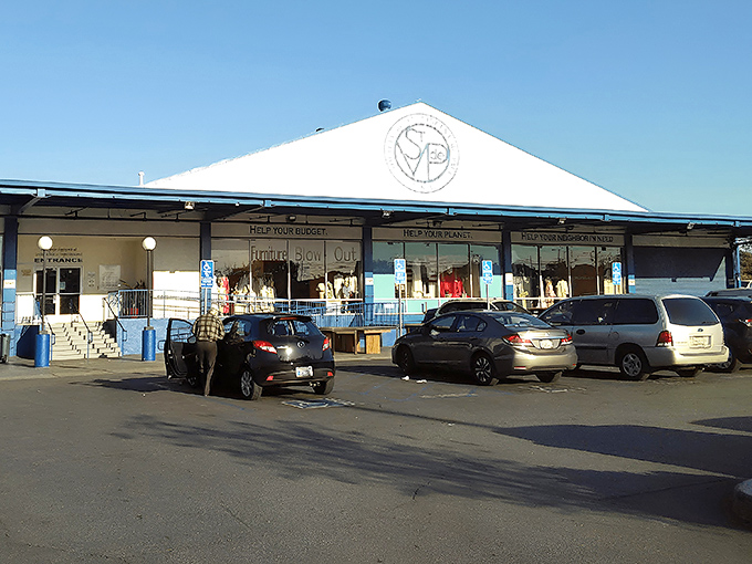 The blue-and-white exterior promises treasure hunting paradise within, where budget-friendly discoveries and planet-saving missions unite under one expansive roof.