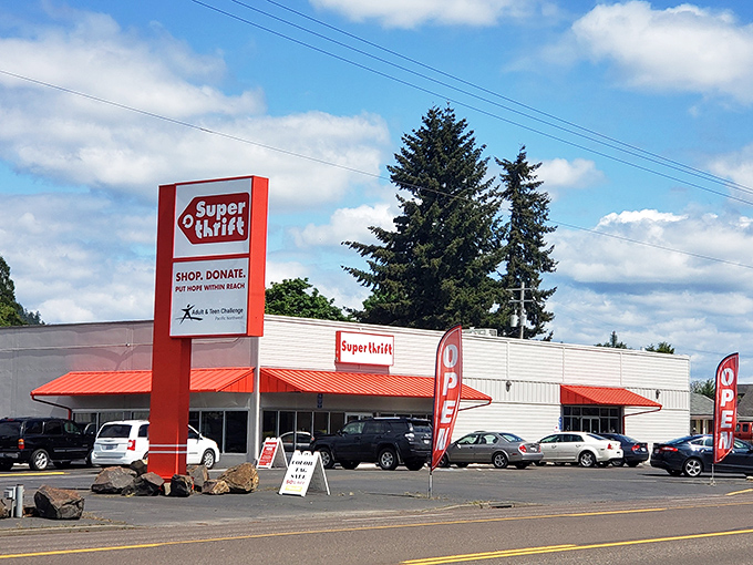 The bold red awning of SuperThrift stands out like a beacon for bargain hunters, promising treasures within its unassuming exterior.