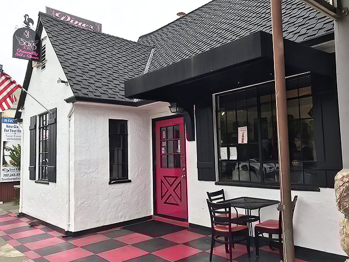 That charming red door isn't just an entrance – it's your gateway to cinnamon roll paradise in Petaluma.