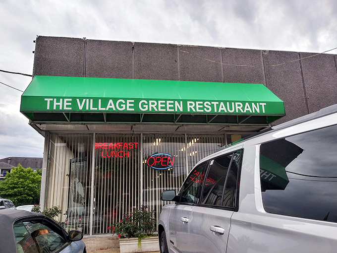 The iconic green awning of Village Green Restaurant stands as a beacon of breakfast hope in Gaithersburg. No frills, just promises of good food within.