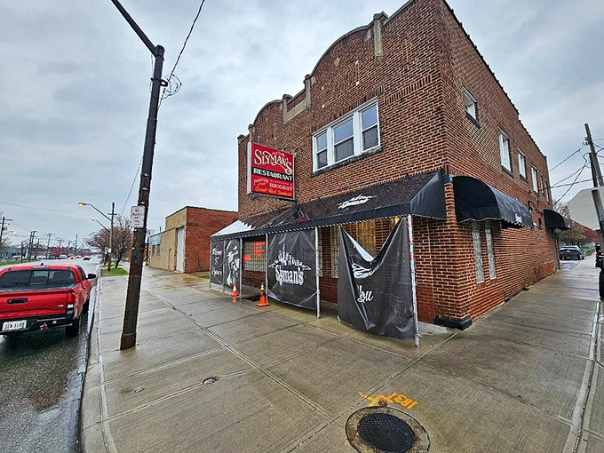 The unassuming brick exterior of Slyman's hides Cleveland's sandwich temple within. Like finding a treasure map in your attic&mdash;unremarkable until you realize what's inside.