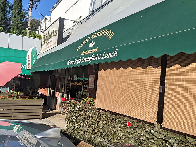 The iconic green awning of Good Neighbor Restaurant stands as a beacon of breakfast hope on Ventura Boulevard. No fancy frills, just the promise of honest food.