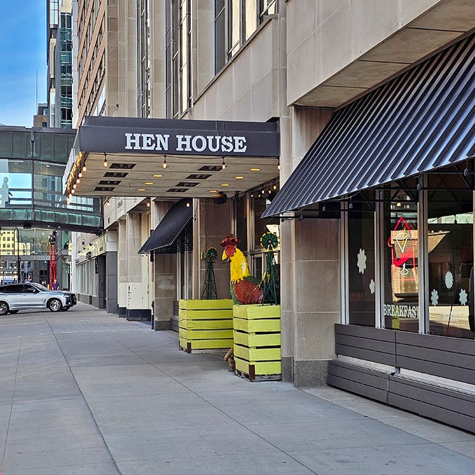 The blue awning of Hen House beckons like a breakfast lighthouse in downtown Minneapolis, promising morning salvation for hungry city dwellers.