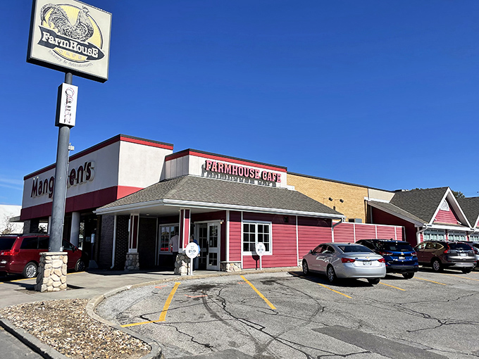 The iconic red exterior of FarmHouse Cafe beckons like a culinary lighthouse in Omaha's dining landscape. Comfort food paradise awaits!