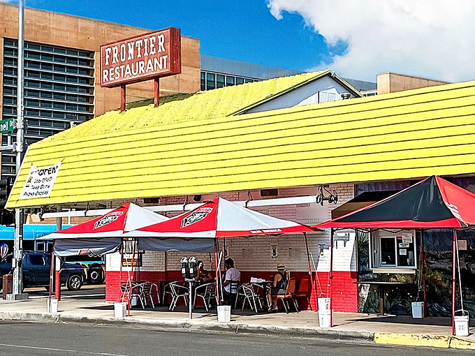 The iconic red and white facade of Frontier Restaurant stands as an Albuquerque landmark, beckoning hungry travelers with promises of New Mexican comfort food.