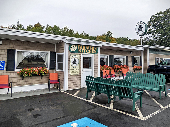 The unassuming exterior of Farmer's Kitchen belies the culinary treasures within. Those colorful flower boxes are your first clue that someone here cares about the details.