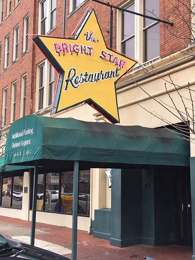 The iconic star-shaped neon sign glows like a beacon for hungry travelers. This isn't just a restaurant&mdash;it's a Bessemer landmark that's been calling folks home since 1907.