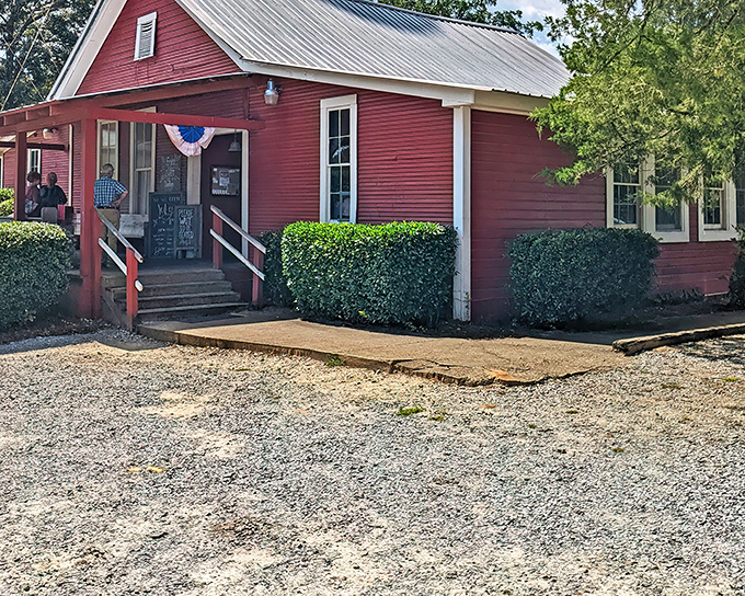 The little red schoolhouse that became a culinary institution stands proudly in Grady, complete with patriotic bunting and a gravel parking lot that's always full at lunchtime.