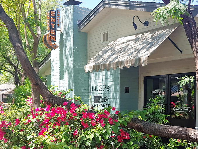 The mint-green exterior with its jaunty striped awning practically whispers, "Come in, the pancakes are calling." A charming first impression that promises good things inside.