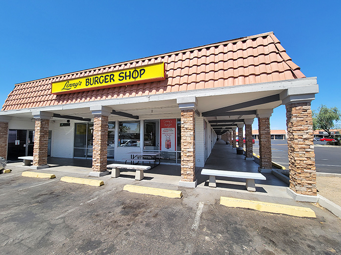 The unassuming terra cotta roof and bright yellow sign promise no frills, just thrills for your taste buds. Arizona's answer to burger paradise.