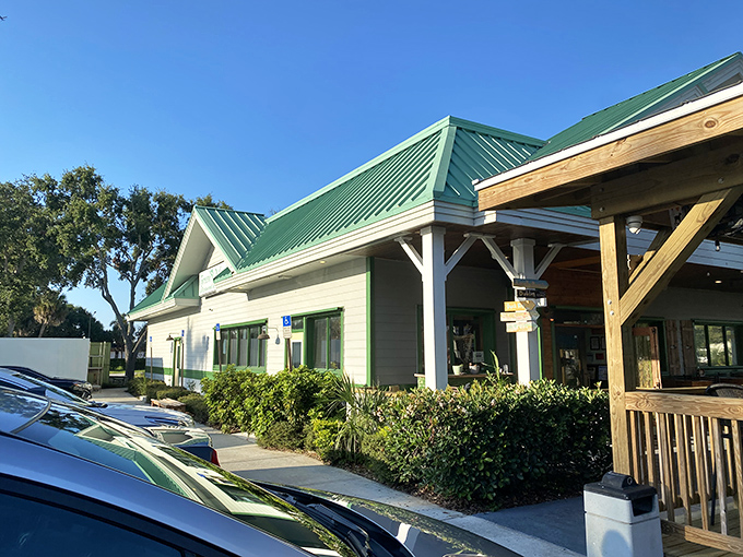 The distinctive green roof isn't just for show&mdash;it's nature's way of saying "seafood this way!" Florida architecture that promises coastal comfort inside.