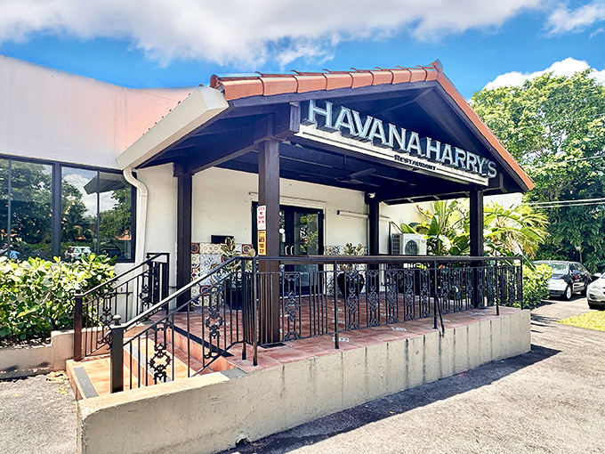 The terracotta-roofed entrance to Havana Harry's stands like a portal to Cuban culinary paradise, promising delicious adventures beyond its doors.