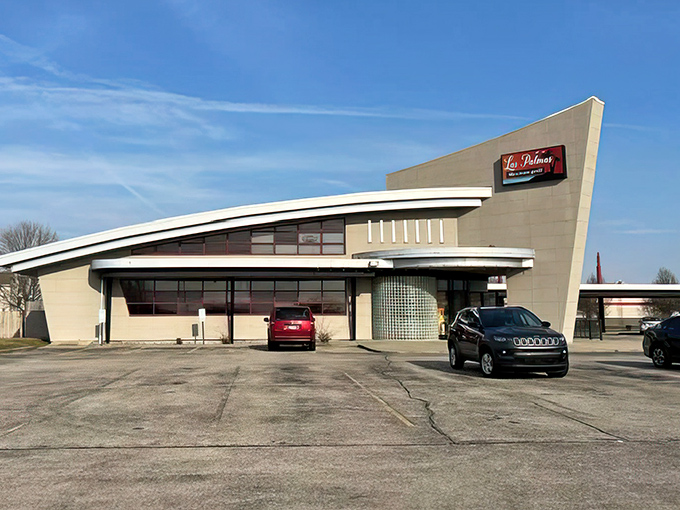 The distinctive mid-century modern architecture of Las Palmas stands out like a delicious anomaly in Champaign's landscape, promising culinary adventures within.