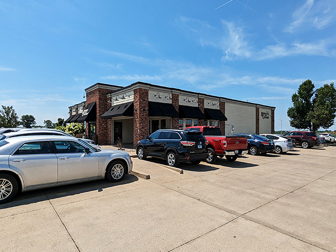 The unassuming brick exterior of Busy Corner belies the culinary treasures within. Like finding a Michelin star in your neighbor's garage.
