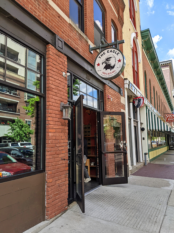 The Eagle's brick exterior on Mass Ave beckons hungry patrons like a siren song. That line forming outside? Consider it a preview of deliciousness to come.