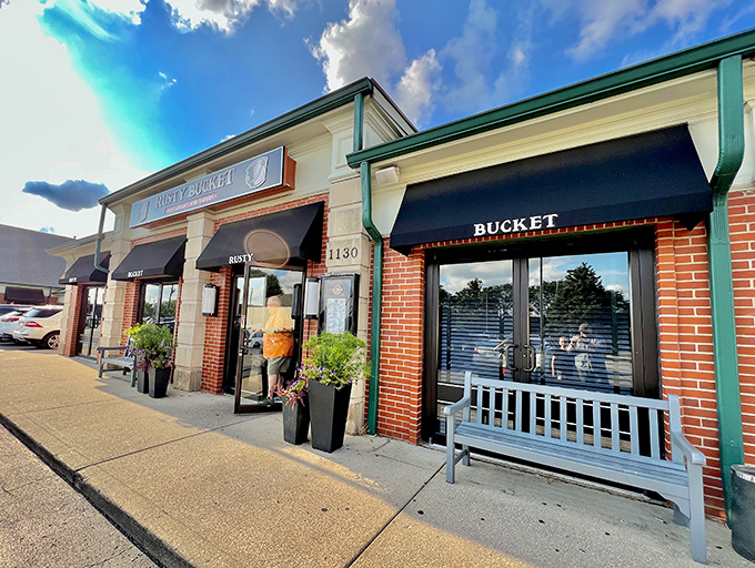 The unassuming exterior of Rusty Bucket belies the culinary treasures within. Like finding a vintage Rolex at a yard sale, this strip mall gem delivers unexpected delights.