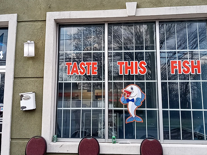 The storefront says it all: bold red letters commanding you to "TASTE THIS FISH," with a cartoon fish that seems to be winking at your good decision.