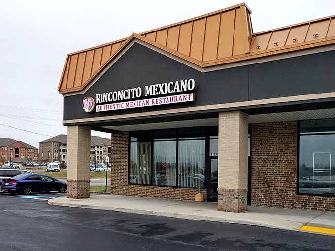The unassuming exterior of Rinconcito Mexicano hides culinary treasures within. Like finding a diamond in a strip mall, this Odenton gem beckons hungry travelers with its copper-topped promise.