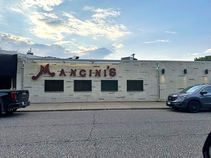 That vintage neon sign isn't just advertising &ndash; it's a time machine promising cocktails, steaks, and an evening where calories don't count.