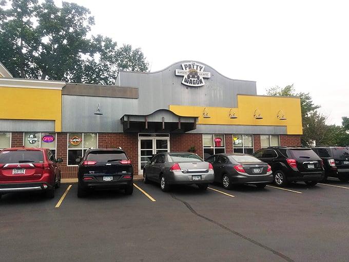 The yellow and gray exterior of The Patty Wagon stands like a beacon of comfort food hope in Minneapolis. No fancy frills, just delicious promises.