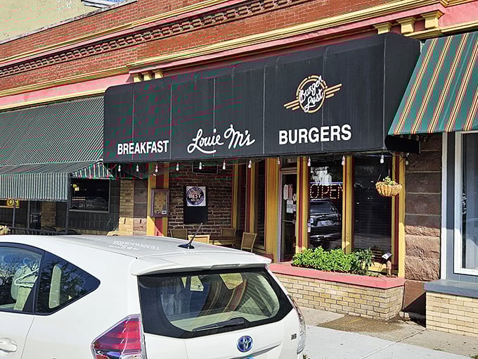 The unassuming storefront of Louie M's Burgerlust stands like a culinary lighthouse in South Omaha, promising breakfast and burgers with equal devotion.