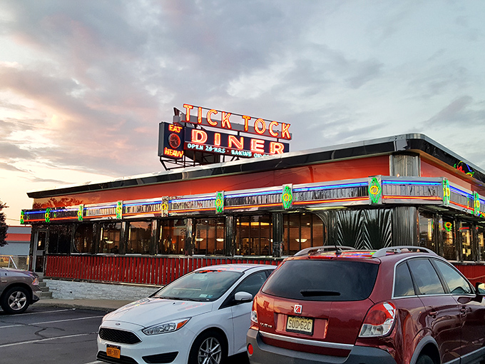 The iconic neon glow of Tick Tock Diner's sign promises 24-hour comfort in a chrome-wrapped package. New Jersey's answer to insomnia and hunger pangs.
