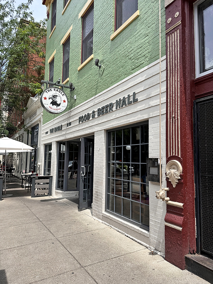 The mint-green facade of The Eagle OTR stands proudly on Vine Street, a beacon of comfort food in Cincinnati's historic Over-the-Rhine neighborhood.